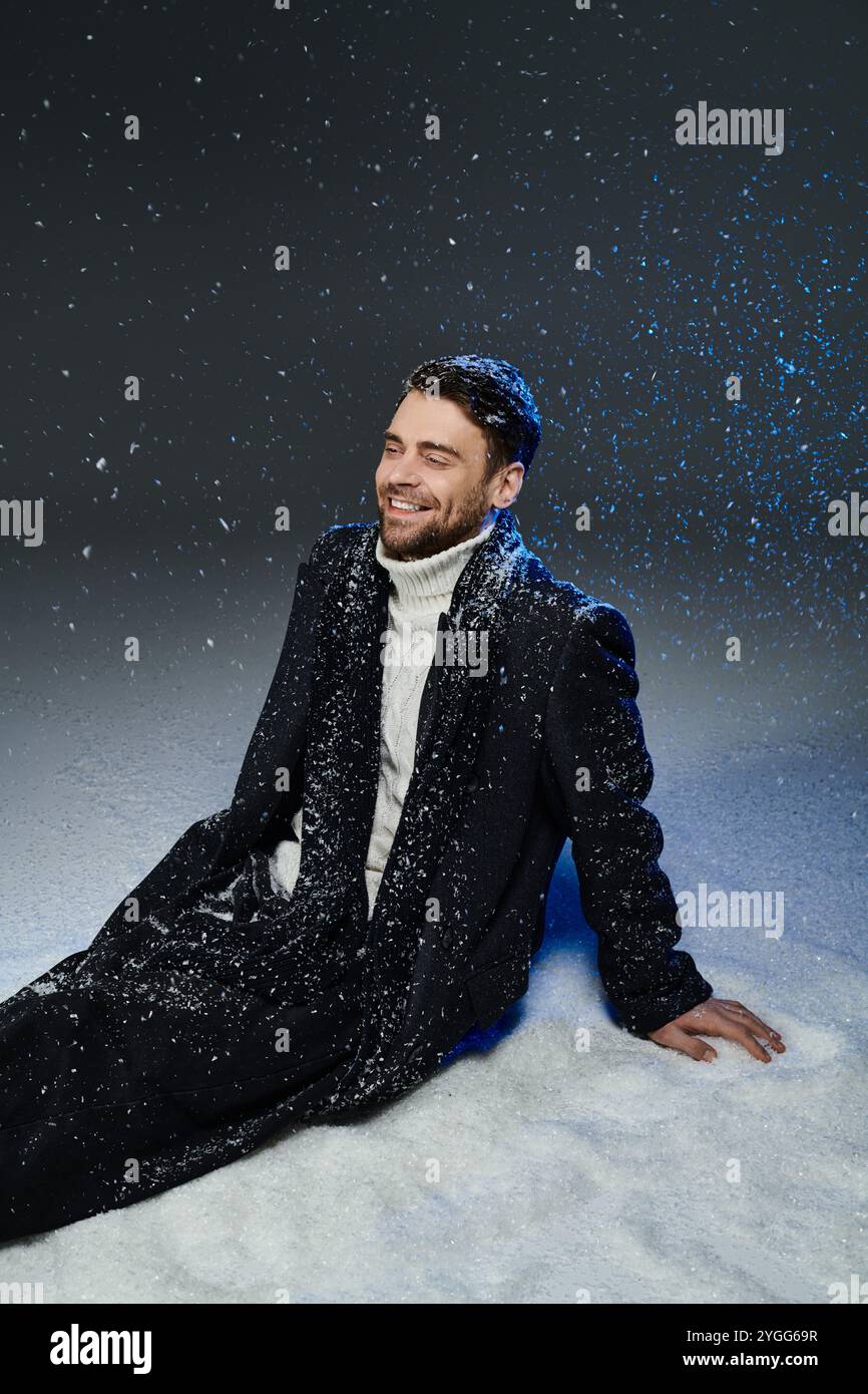 Young man smiles brightly snowflakes hi-res stock photography and ...