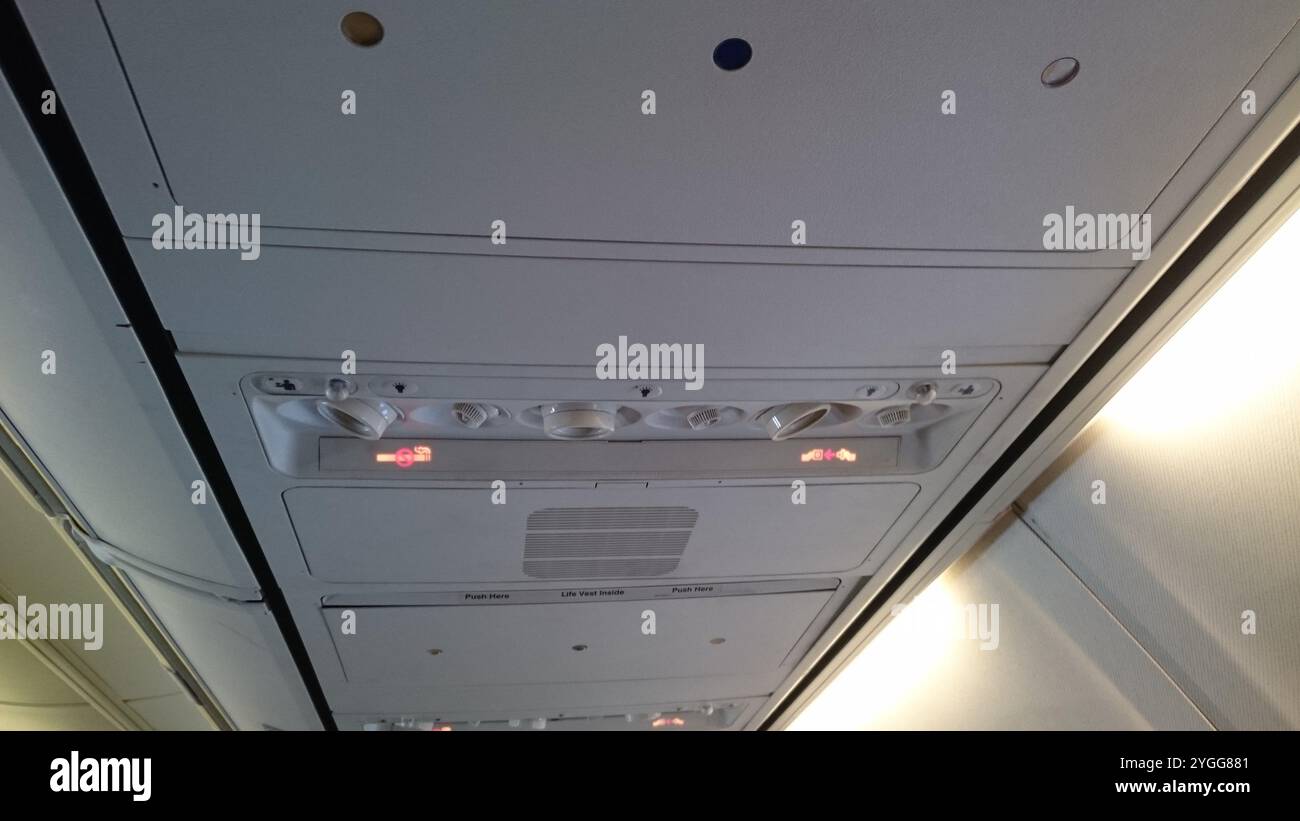 Overhead Air ventilations and reading lights in Boeing 737 comercial ...