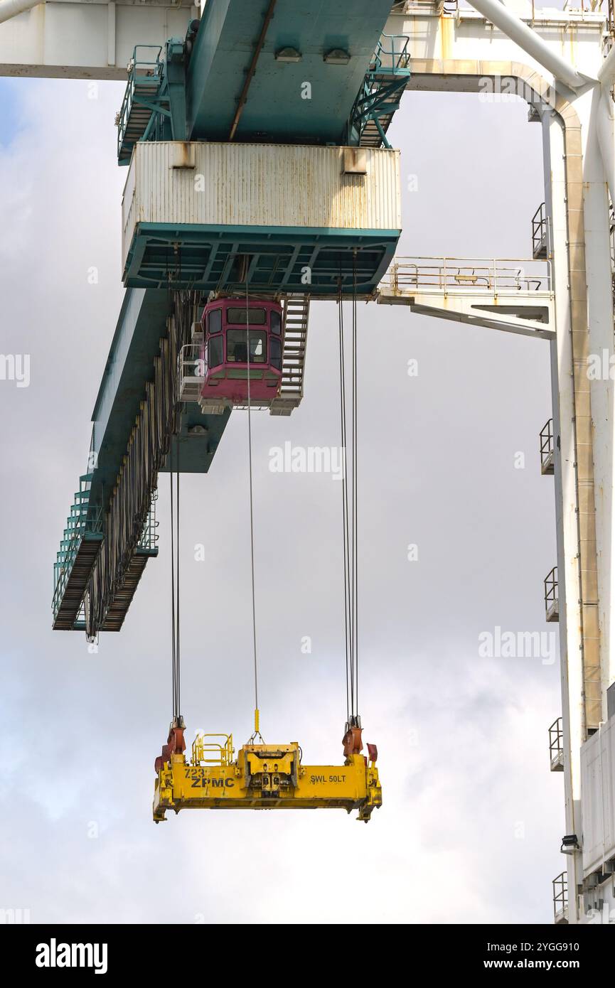 Miami, Florida, USA - 1 December 2023: Grab mechanism on a dockside ...
