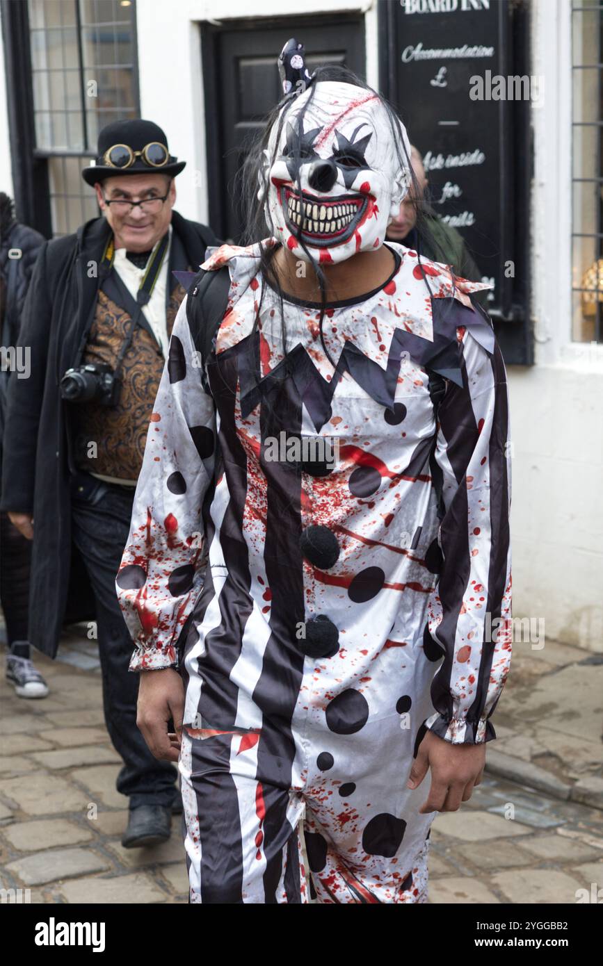 scary clown covered in blood at the Whitby Goth Weekend Stock Photo - Alamy