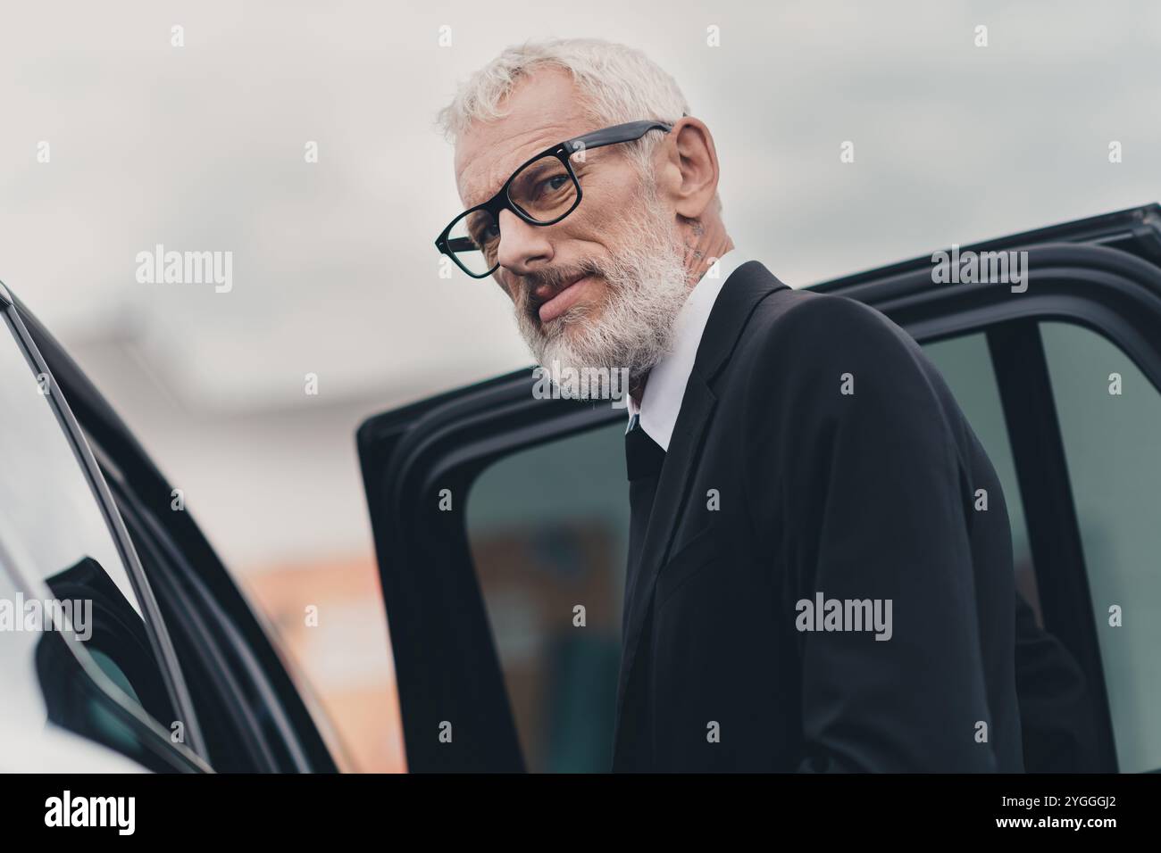Man is stepping out of car hi-res stock photography and images - Alamy