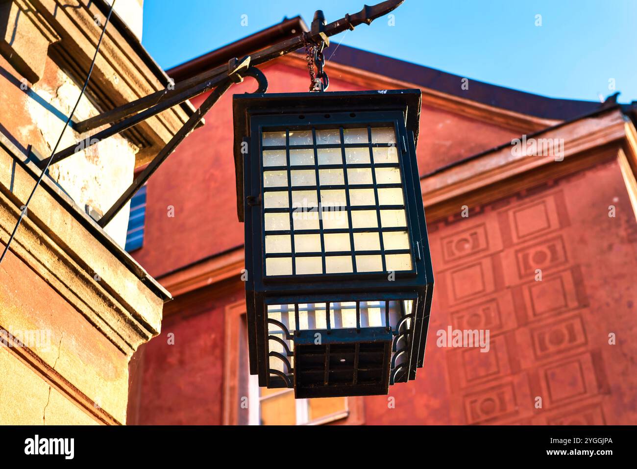 Ancient lantern hanging on the wall of Barbican in Warsaw, Poland Stock ...