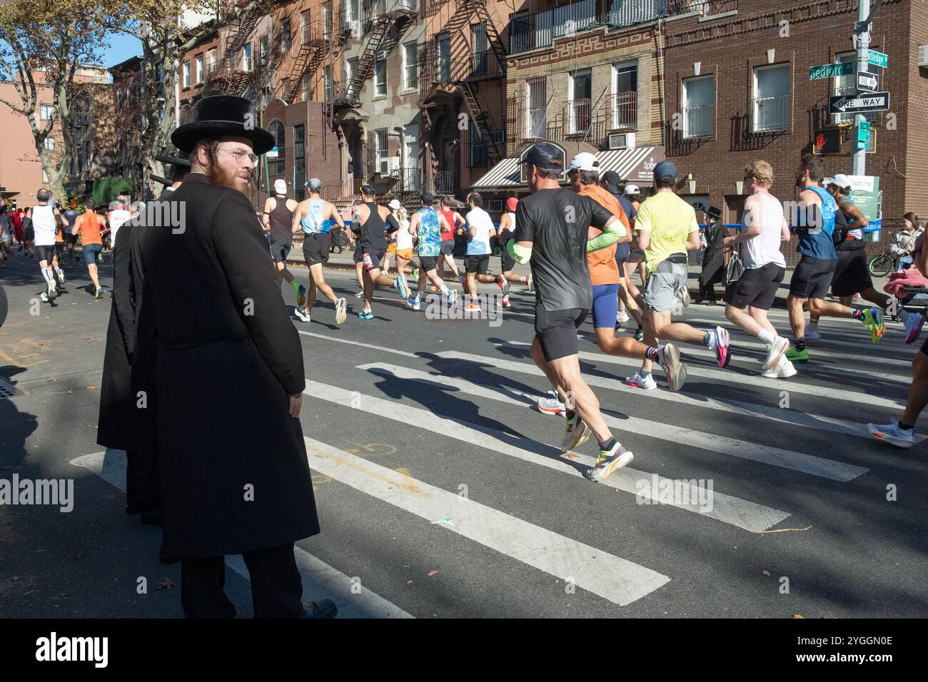 An orthodox Jewish man contemplates how to cross the street and avoid ...