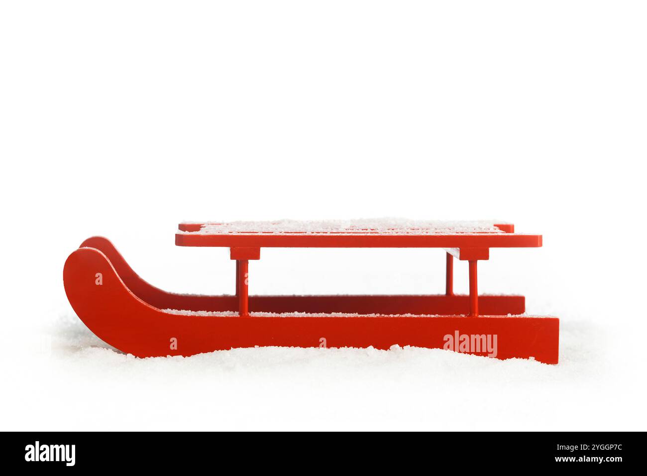 Wooden red sled isolated on white background Stock Photo - Alamy