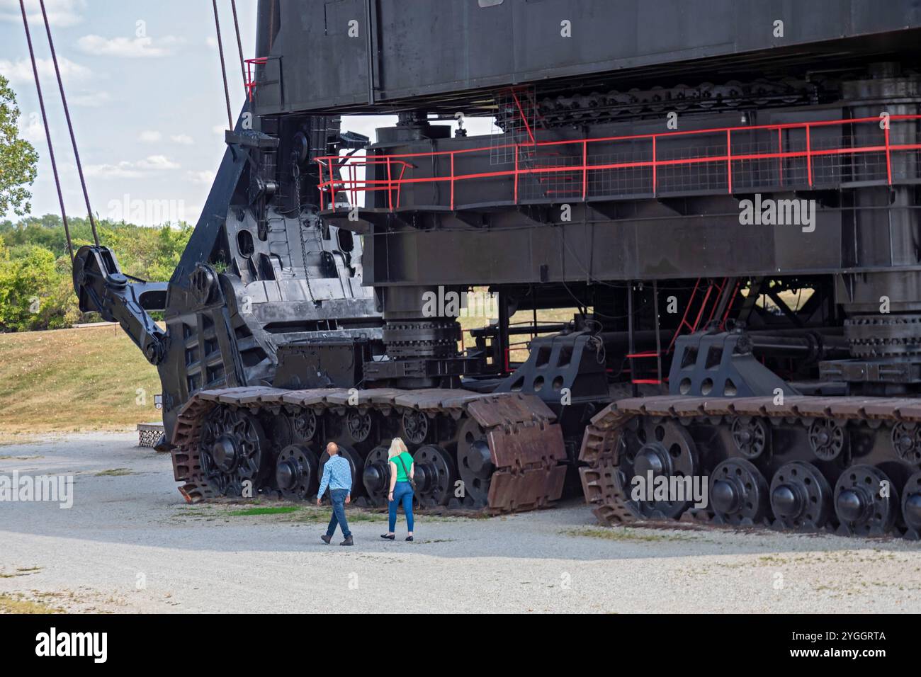 West Mineral, Kansas - Two people walk past the crawlers on Big Brutus ...
