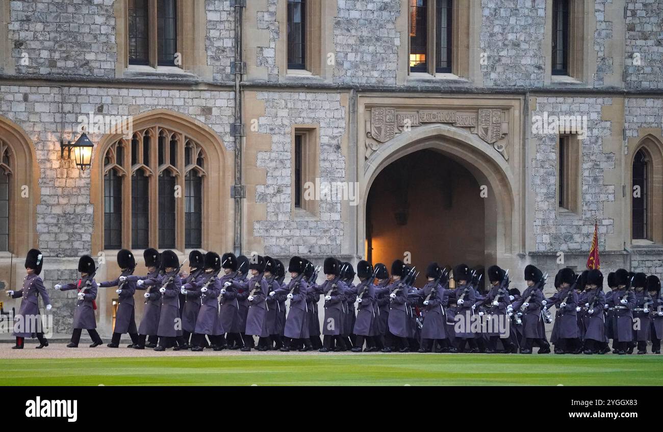 Members of the 1st Battalion Welsh Guards, march into the quadrangle ...