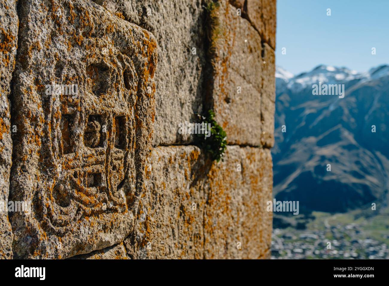 Close-up detail of intricate stone carvings on the ancient walls of ...