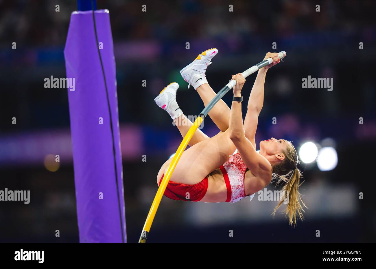 Alysha Newman participating in the pole vault at the Paris 2024 Olympic ...