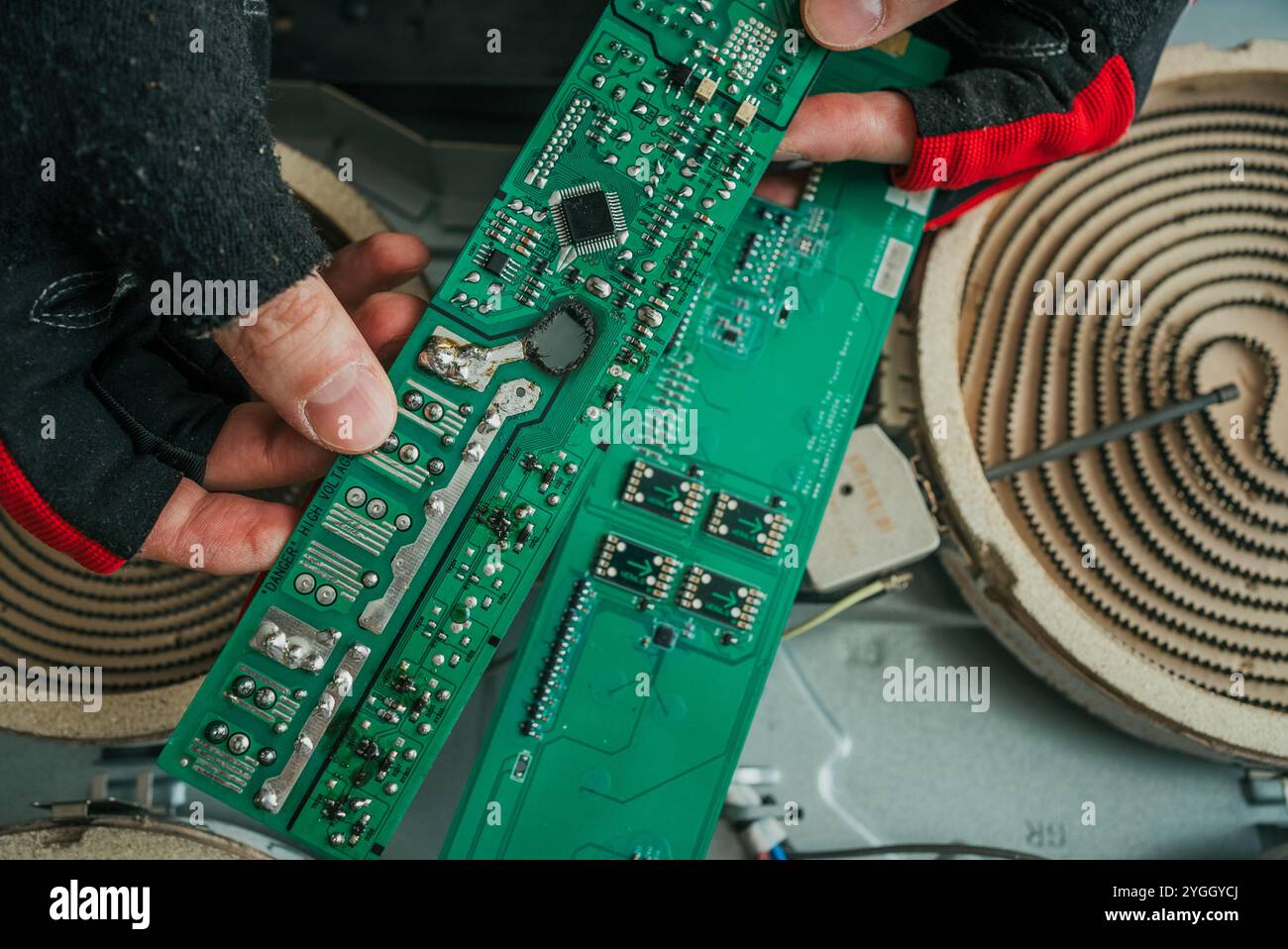 Technician hands inspecting damaged hi-res stock photography and images ...