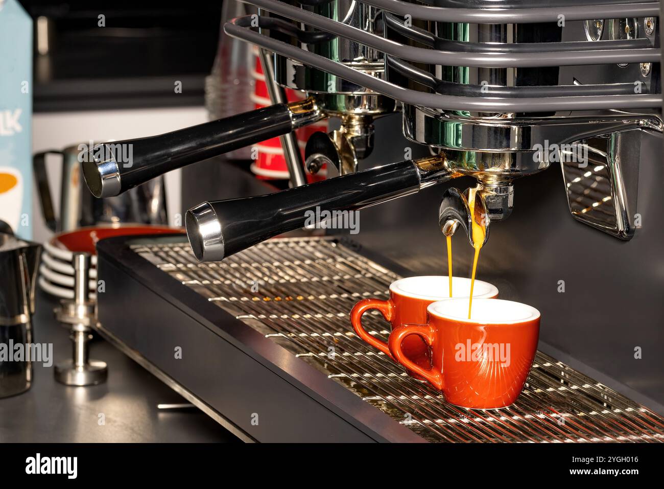 Brewing the perfect espresso shot in a modern cafe kitchen during the ...