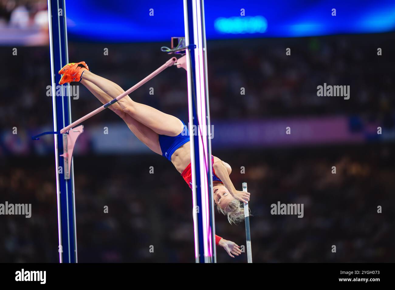 Katie Moon participating in the pole vault at the Paris 2024 Olympic ...