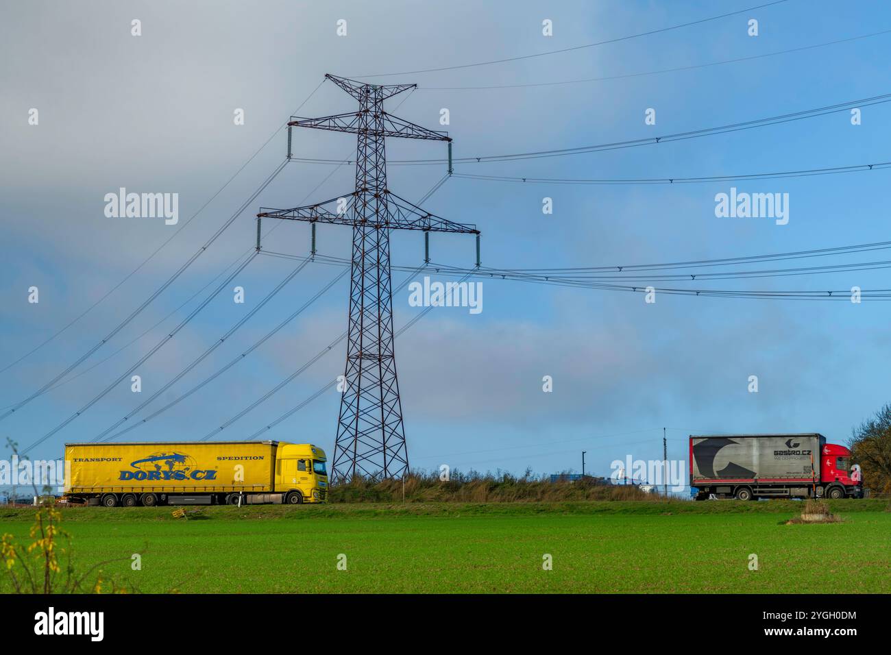 High voltage electric post wire near construction of new highway in ...