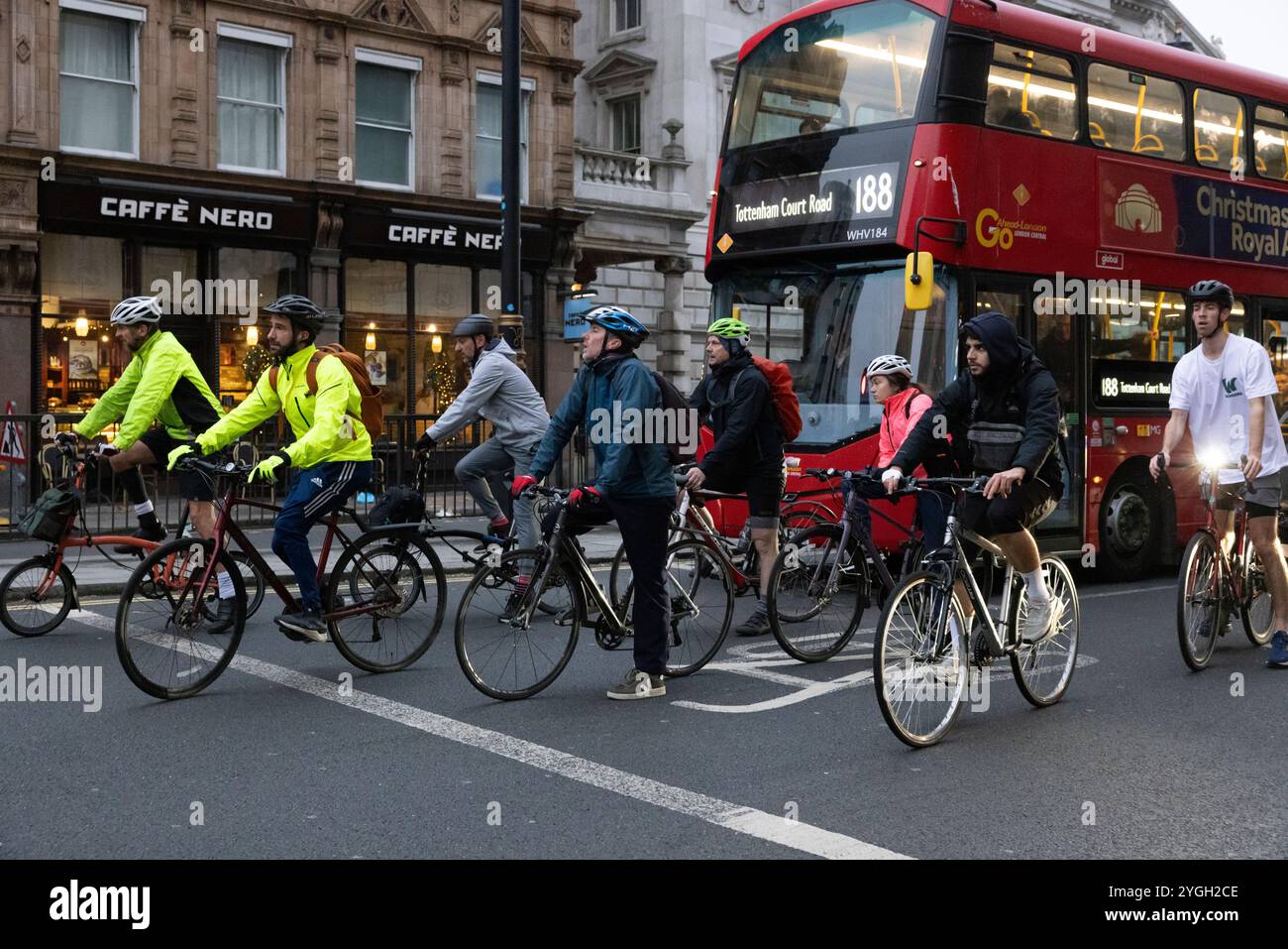 London commuters line up at the traffic lights on their bicycles at The ...