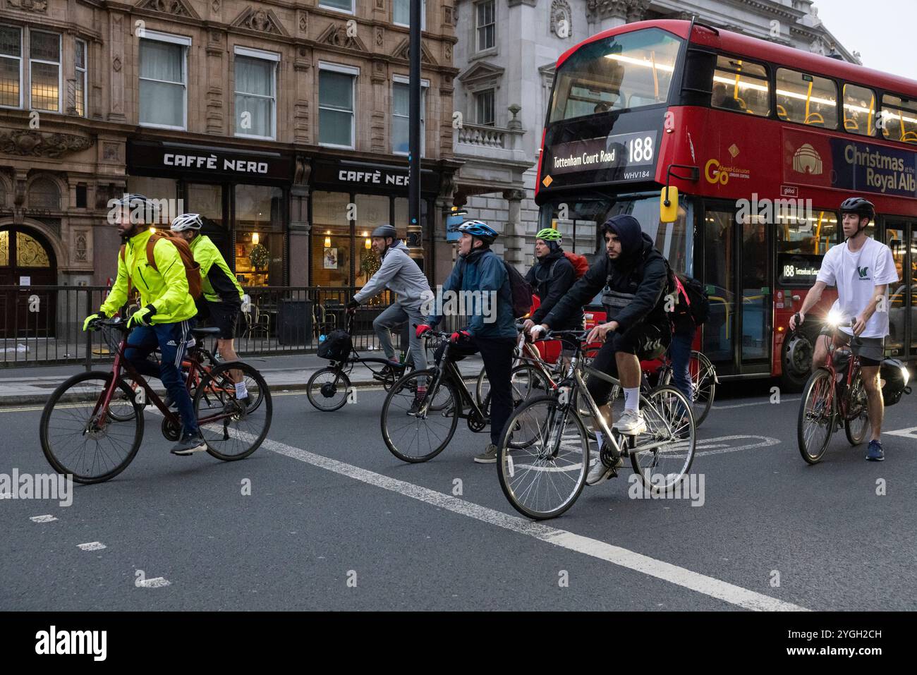 London commuters line up at the traffic lights on their bicycles at The ...