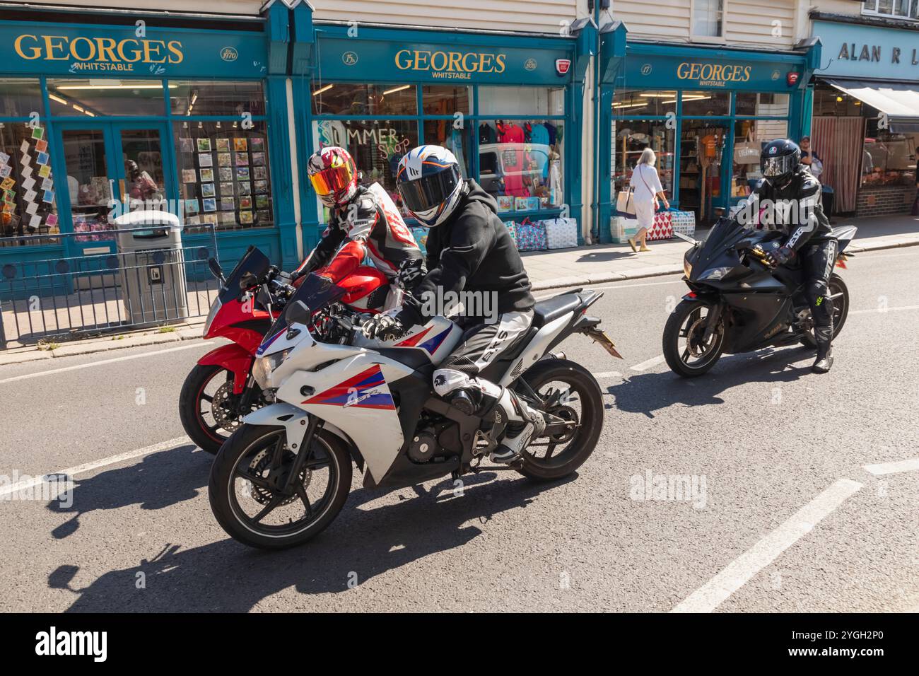 Group motorcyclists riding through hi-res stock photography and images ...