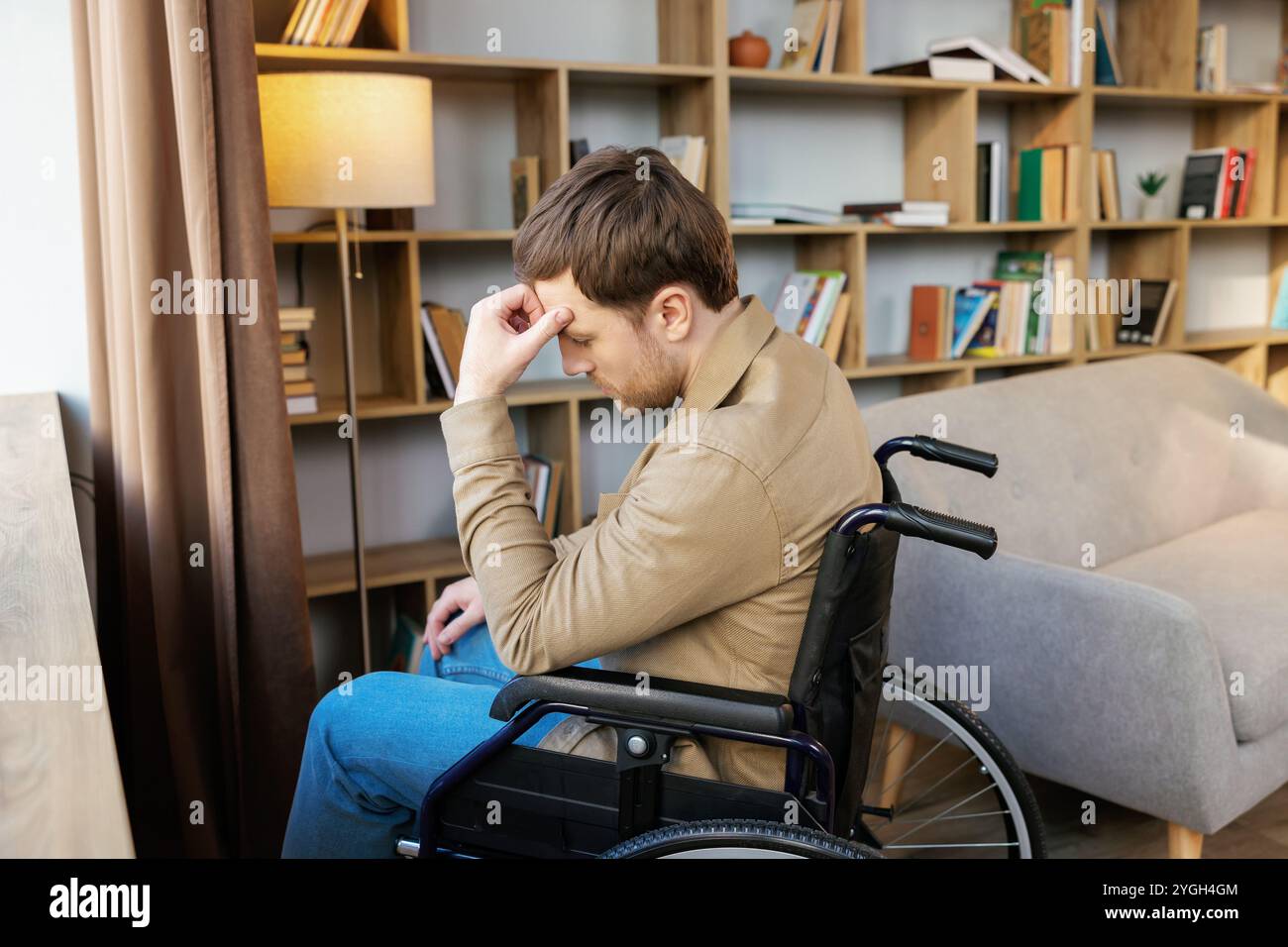 Lonely handicapped man in wheelchair hi-res stock photography and ...