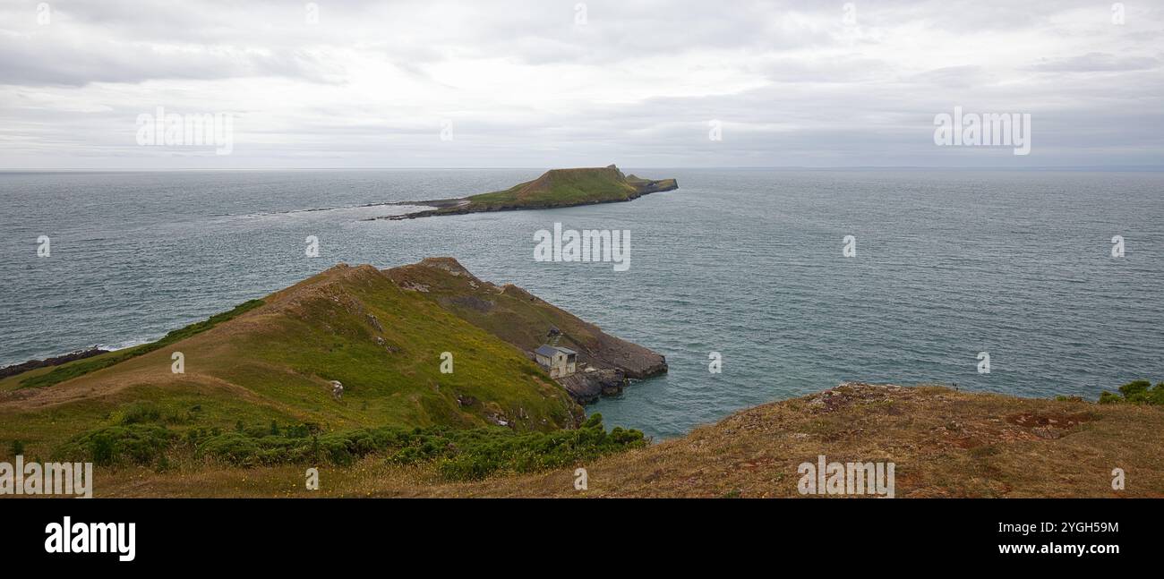 The tidal island Worm's Head at the coast of Rhossili in Wales Stock ...