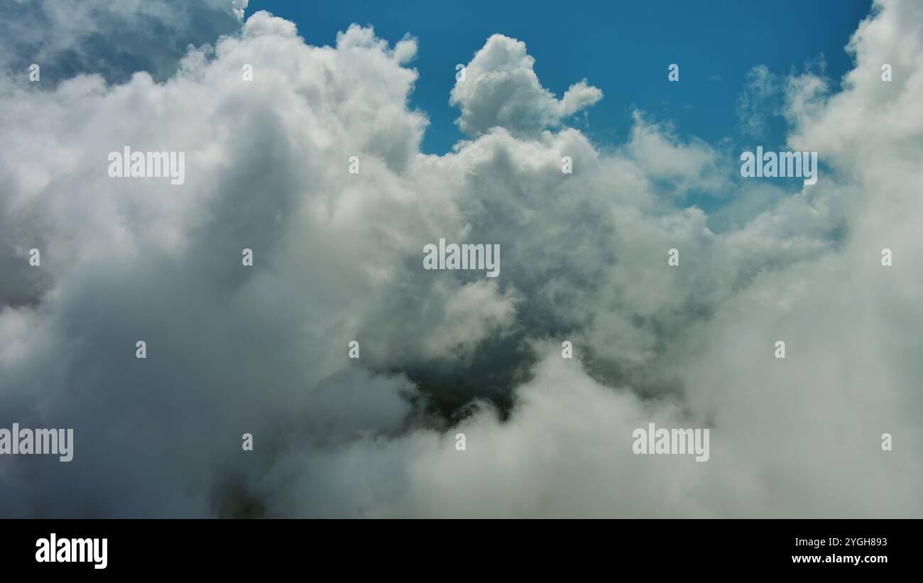 Aerial flying through beautiful clouds hi-res stock photography and ...