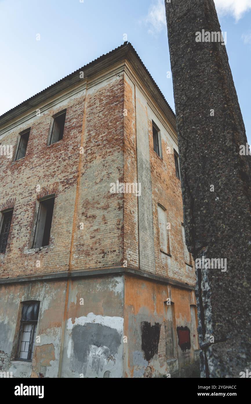 An abandoned building with no windows. An old abandoned, forgotten ...