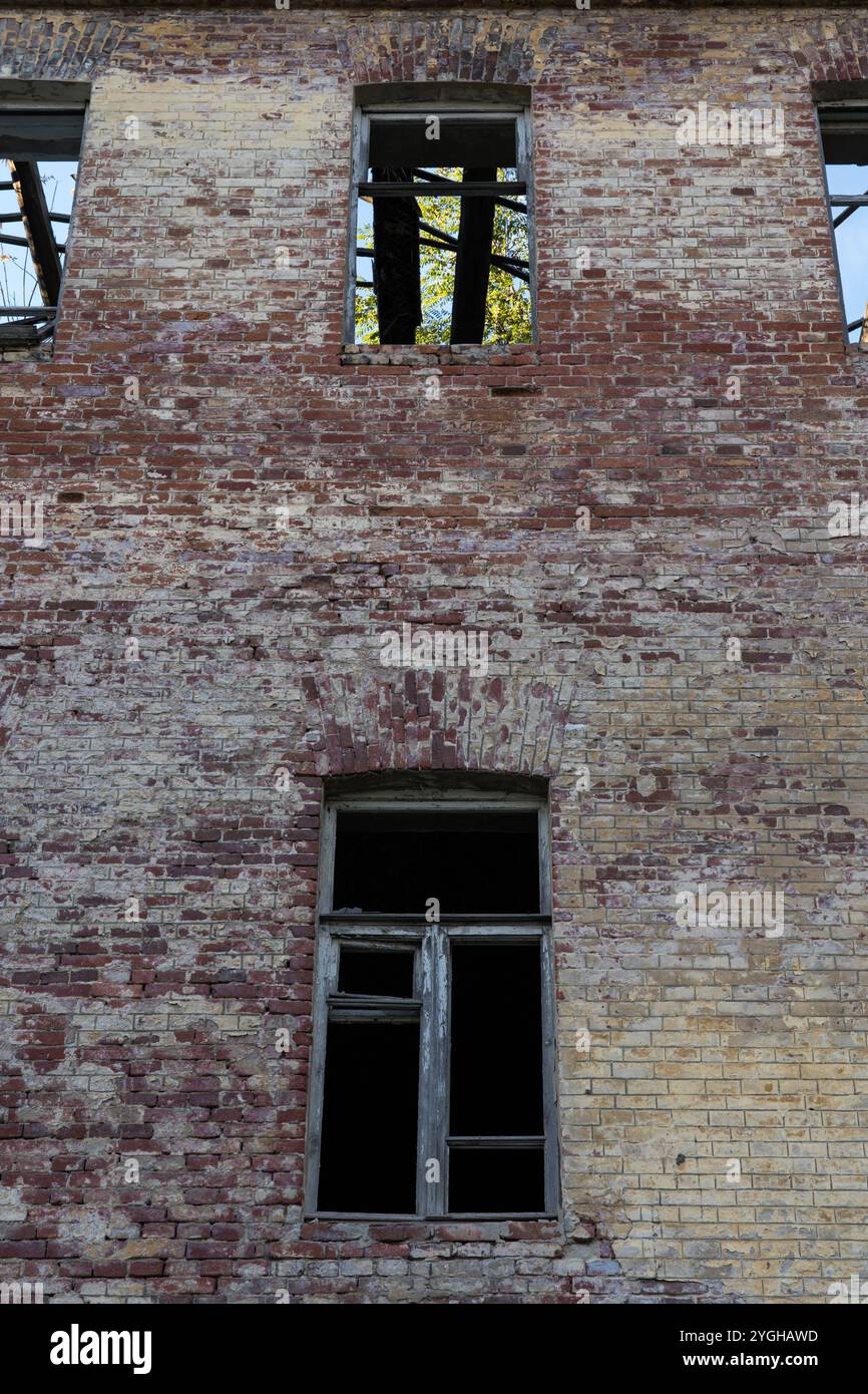 An abandoned building with no windows. An old abandoned, forgotten ...