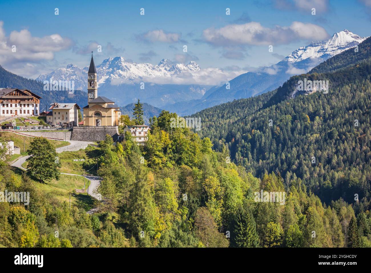 the small town of Cibiana di Cadore, view with the parish church and in ...