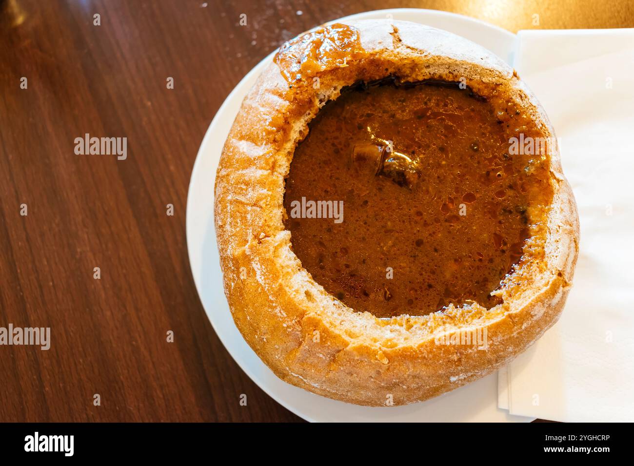 Traditional Czech food. Goulash soup in bread pot. Prague, Czech ...