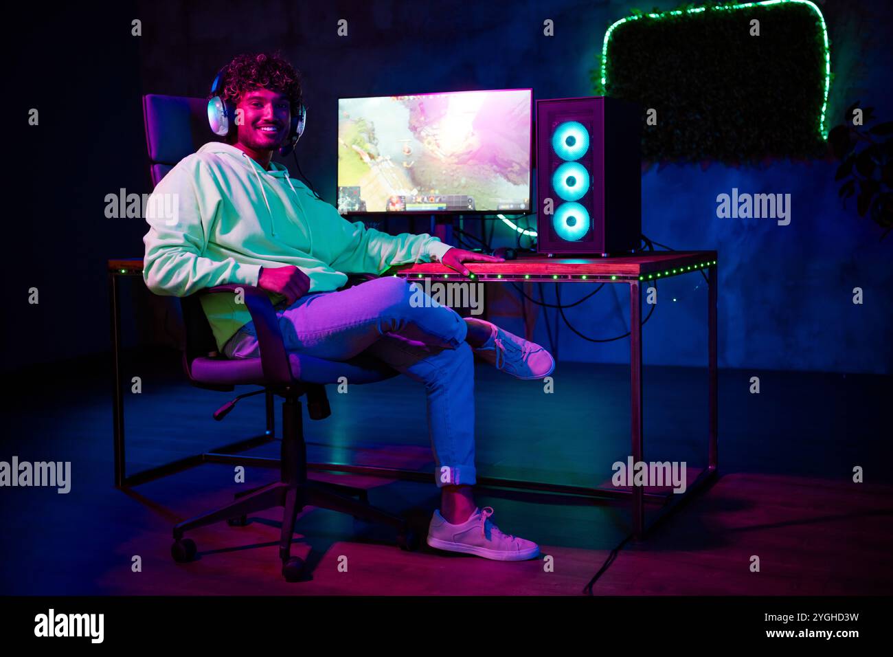Full size photo of gamer nice young male sit armchair play computer ...
