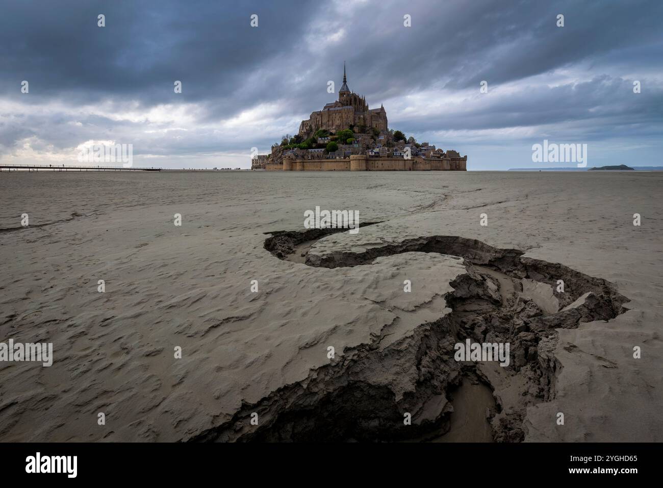 View of Le Mont Saint Michel from the beach formed at low tide ...