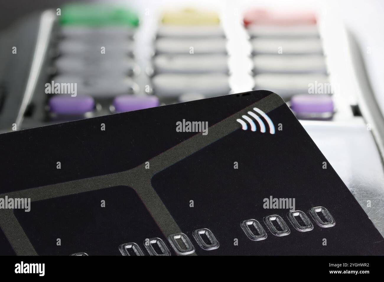 bank card for nfc based payment held over payment terminal Stock Photo ...