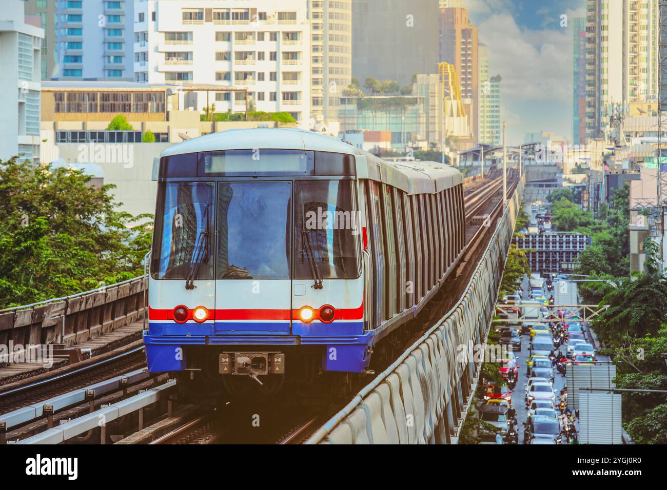 BTS Sky Train is running in downtown of Bangkok. Sky train is fastest ...