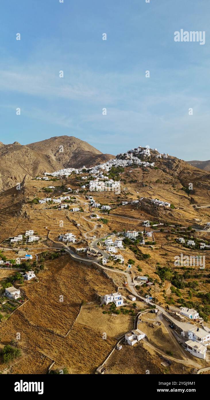 Traditional hillside village in Greek islands with white buildings ...