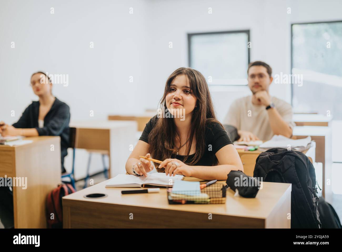 Engaged high school students attending class with focus and attention ...