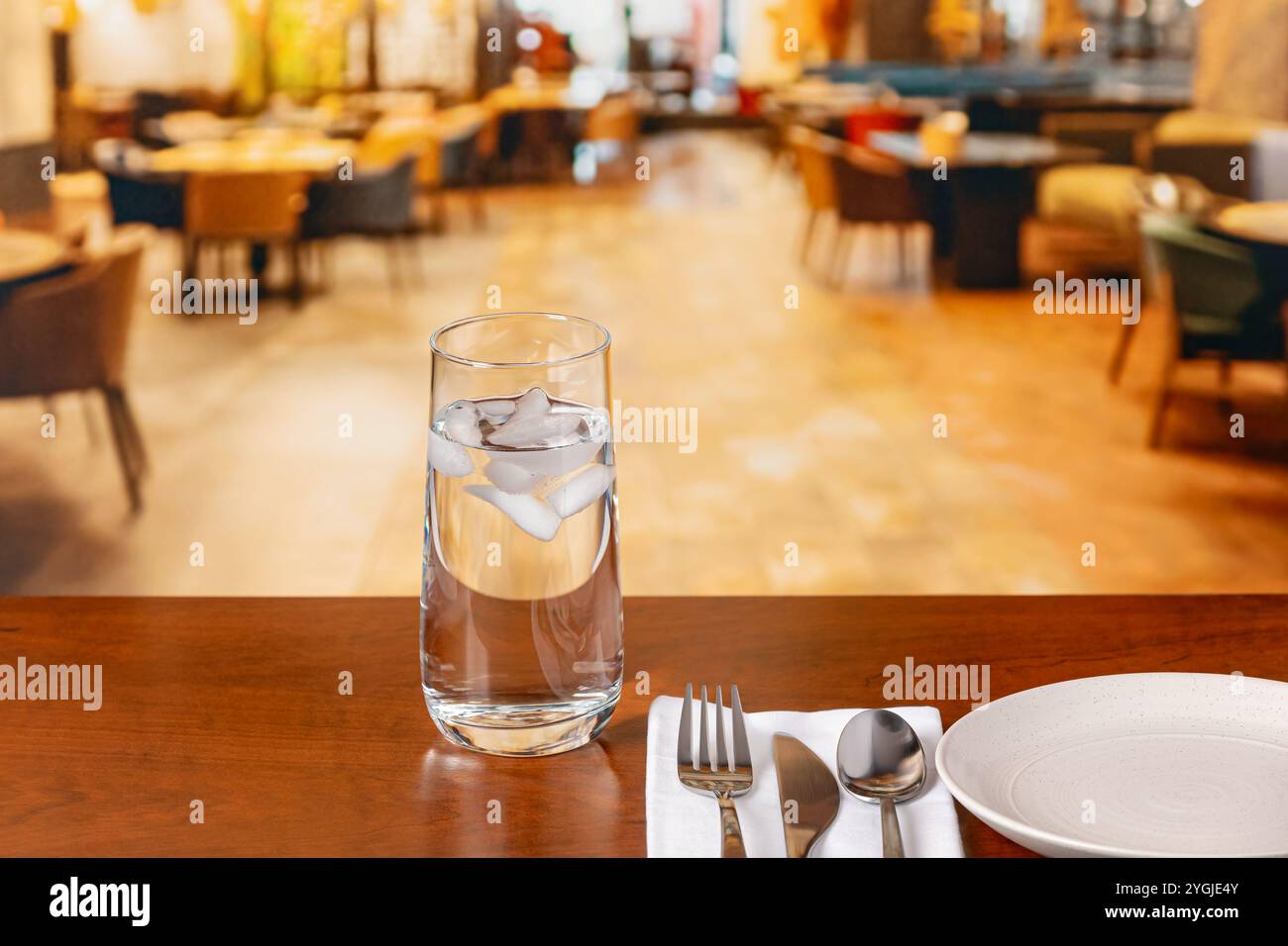 Glass of water on restaurant table. Clean drinking water, water ...