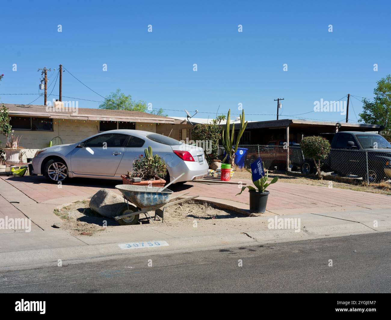 Latinos for Harris campaign sign in trashcan following the presidential ...