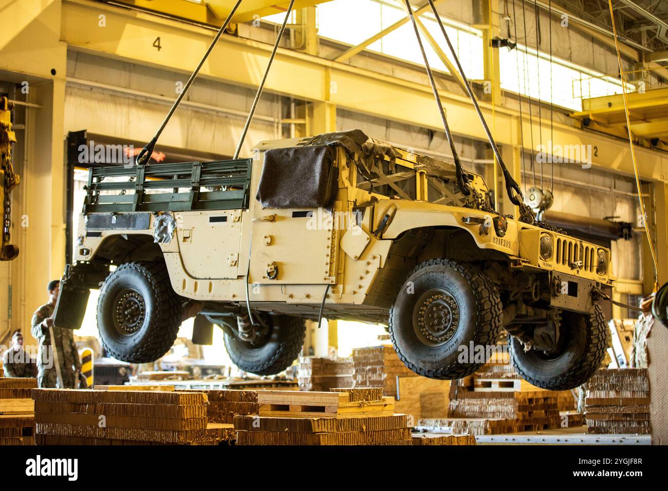 Paratroopers assigned to the 82nd Airborne Division prepare a M1152 ...