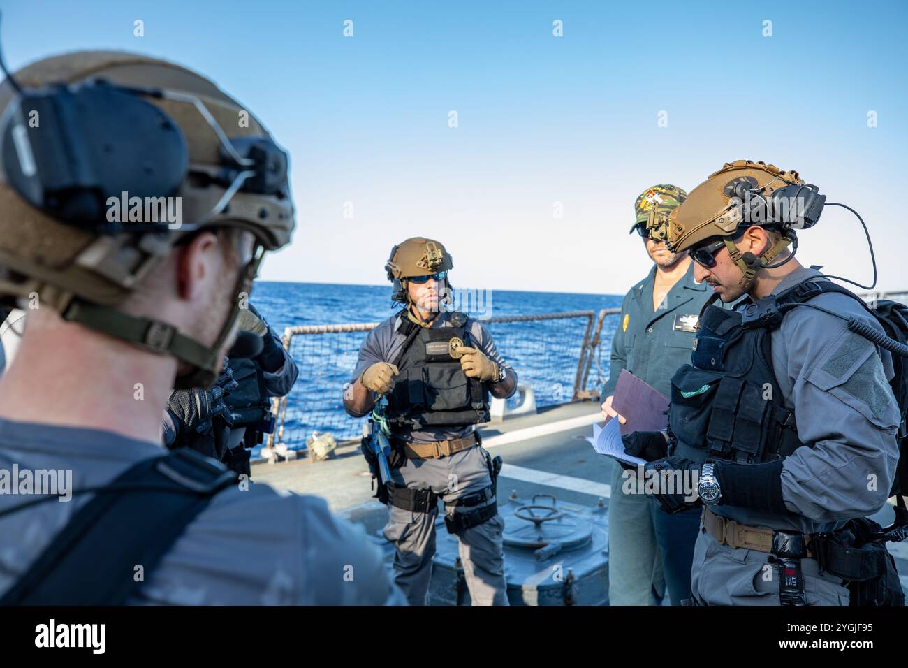 241025-N-AY869-1083 MEDITERRANEAN SEA (Oct. 25, 2024) Sailors receive a ...