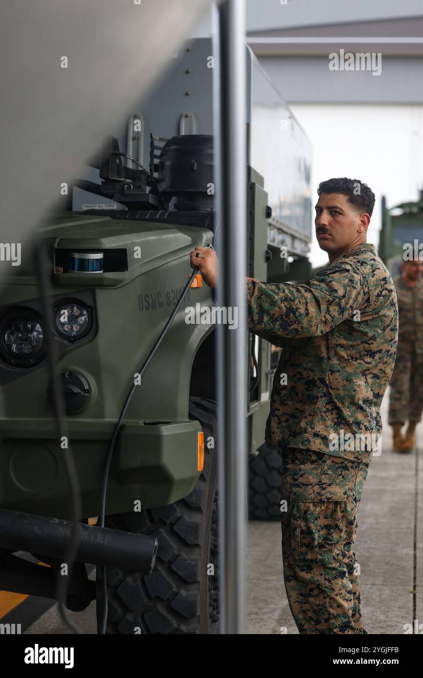A U.S. Marine with 3d Littoral Combat Team, 3d Marine Littoral Regiment ...