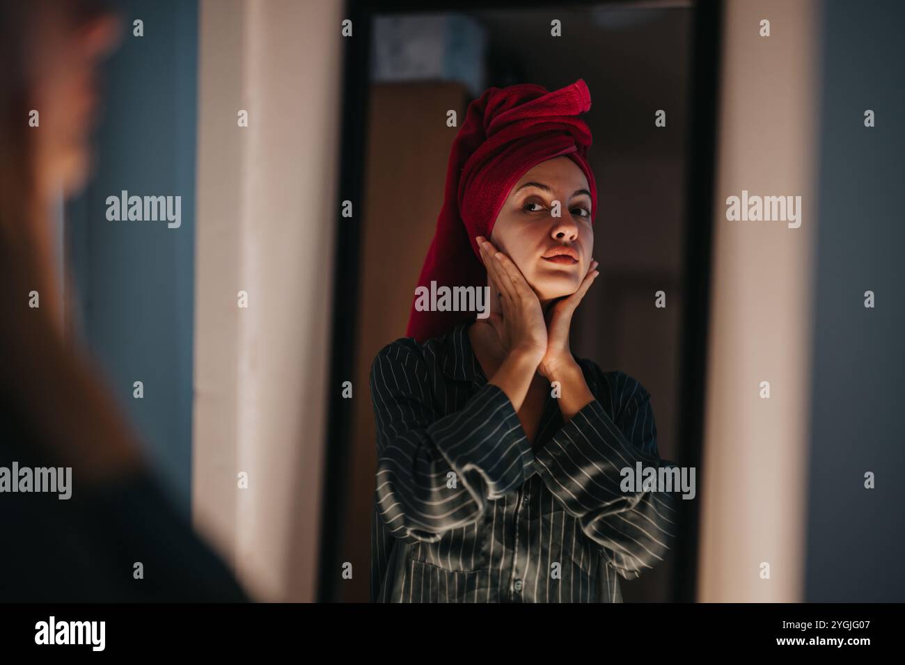 Woman looks mirror after hi-res stock photography and images - Alamy