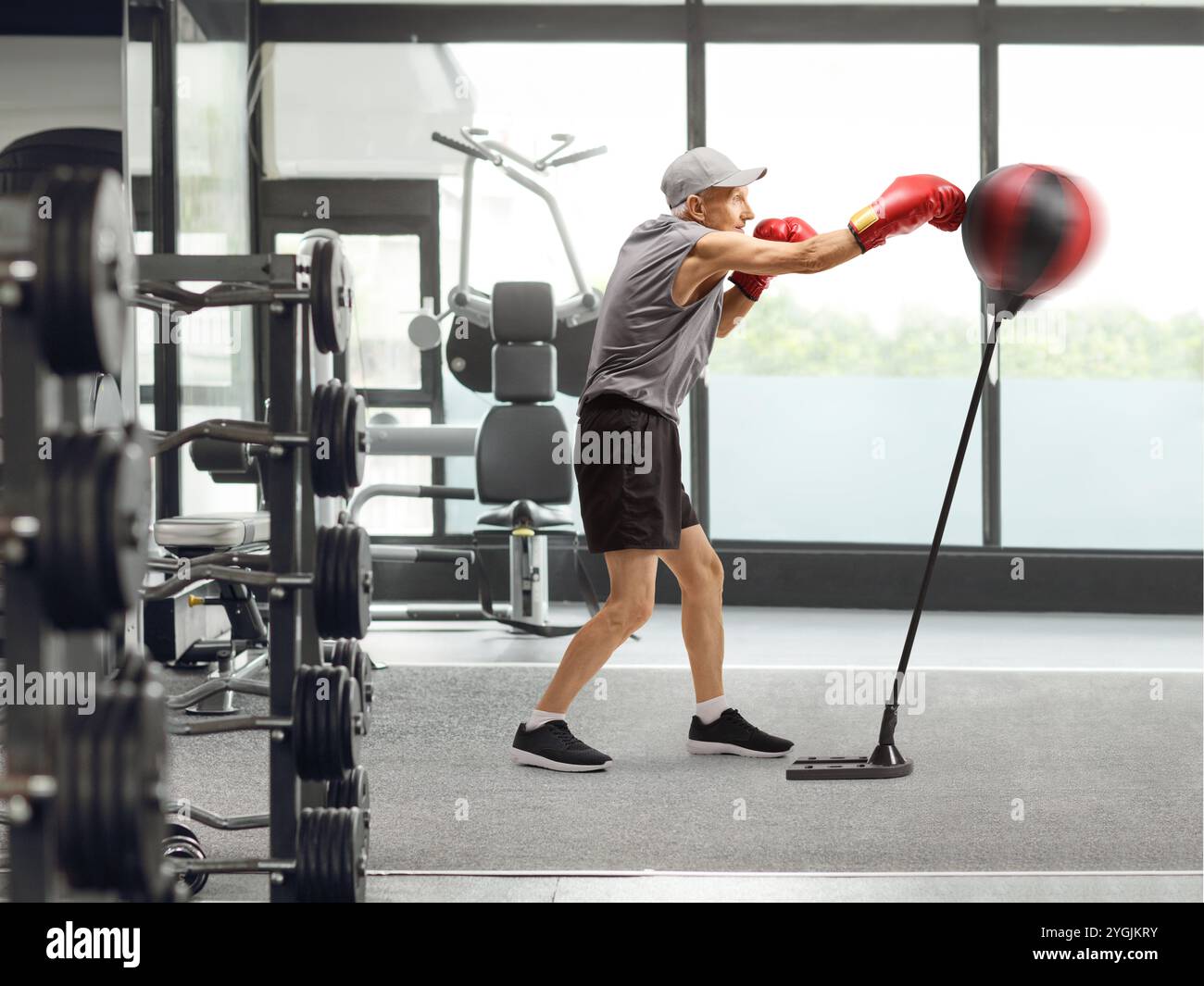 Boxing glove hitting punching bag hi-res stock photography and images ...