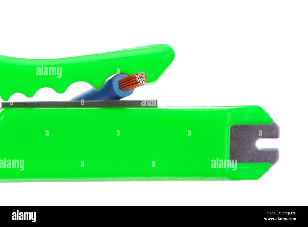 Green Wire Stripping Tool with Exposed Copper Wire Stock Photo - Alamy