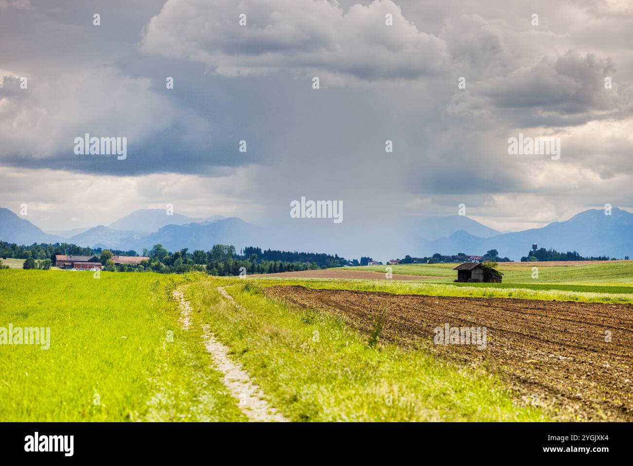 local rain shower in front of alpine panorama, Germany, Bavaria ...