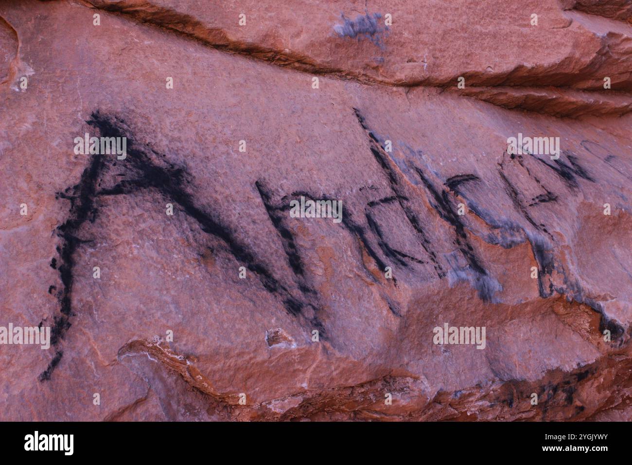 Rock graffiti in White Wash Sand Dunes Stock Photo - Alamy