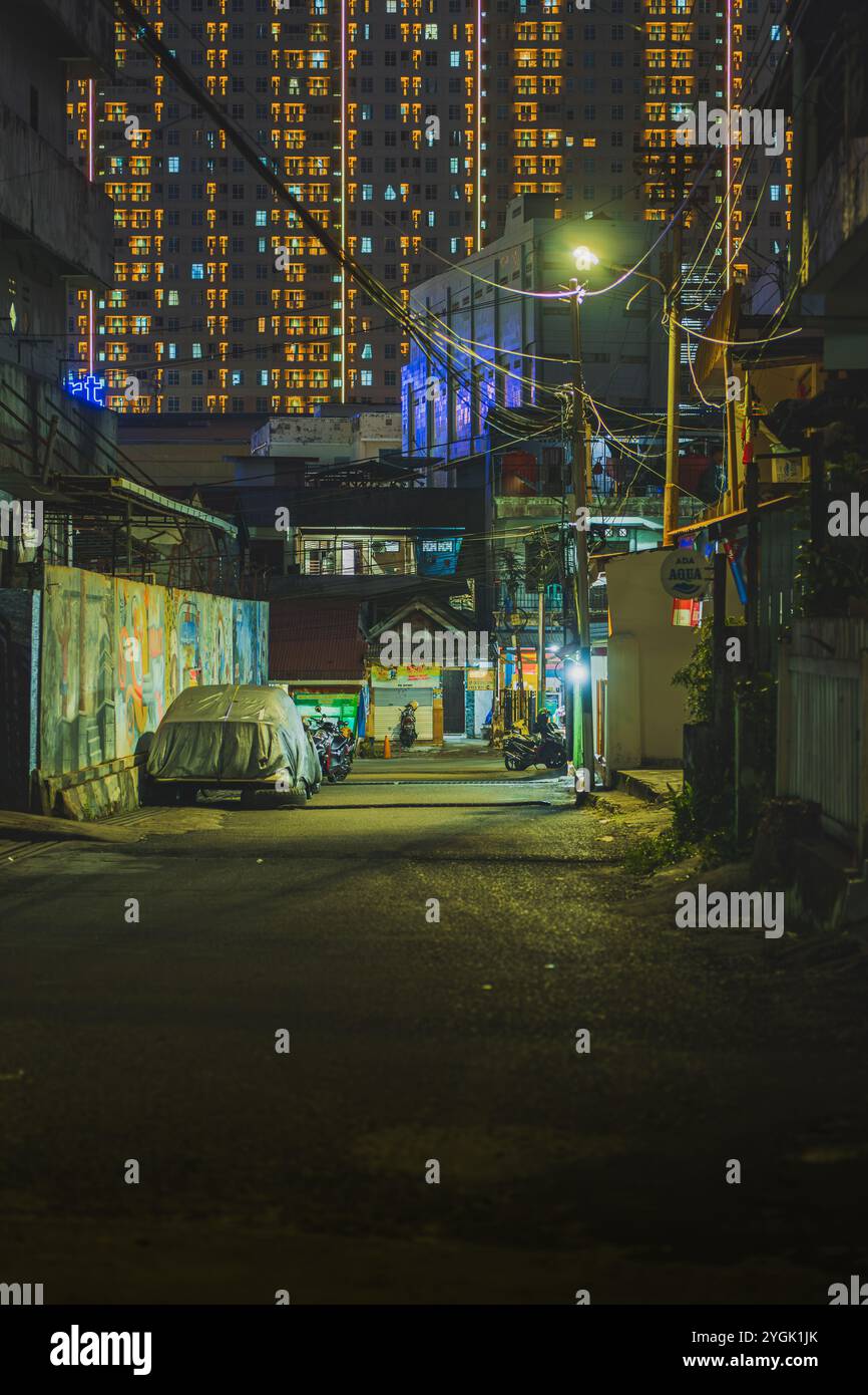 Balikpapan, Indonesia - September 3rd, 2024. a narrow alleyway in a ...