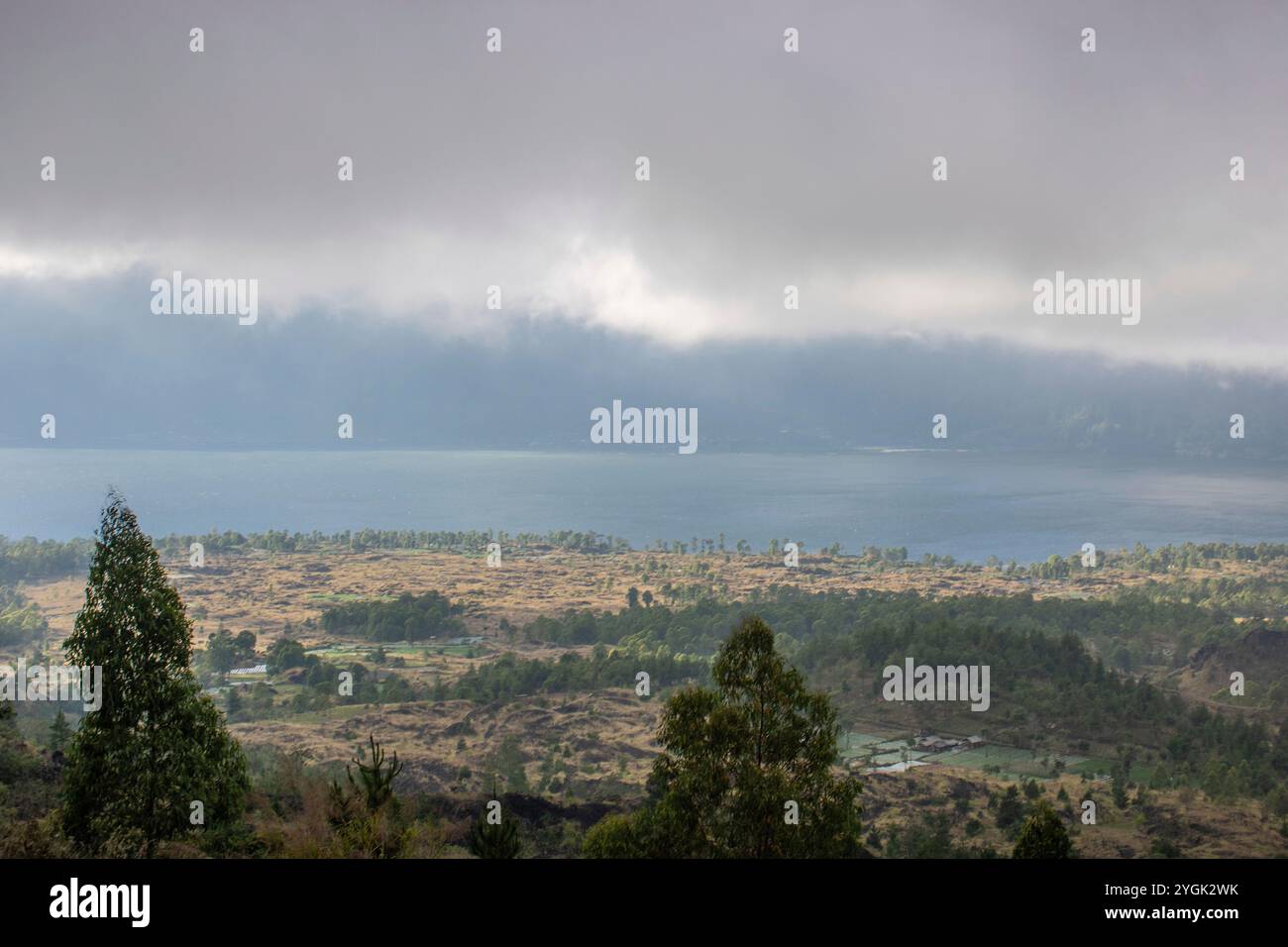 Fantastic sunrise on a volcano. View upwards and in the clouds to the ...