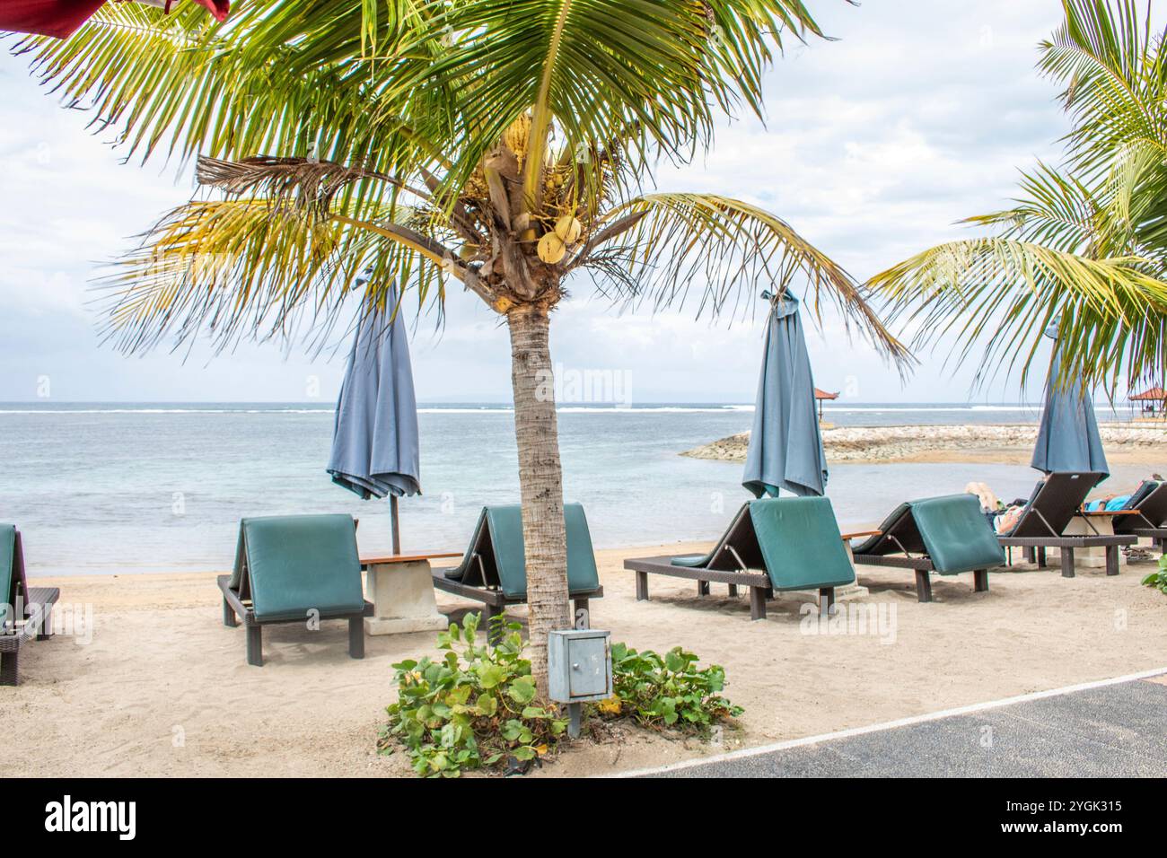 A beach with sea and sun loungers of a hotel, Sanur, Bali, Indonesia ...