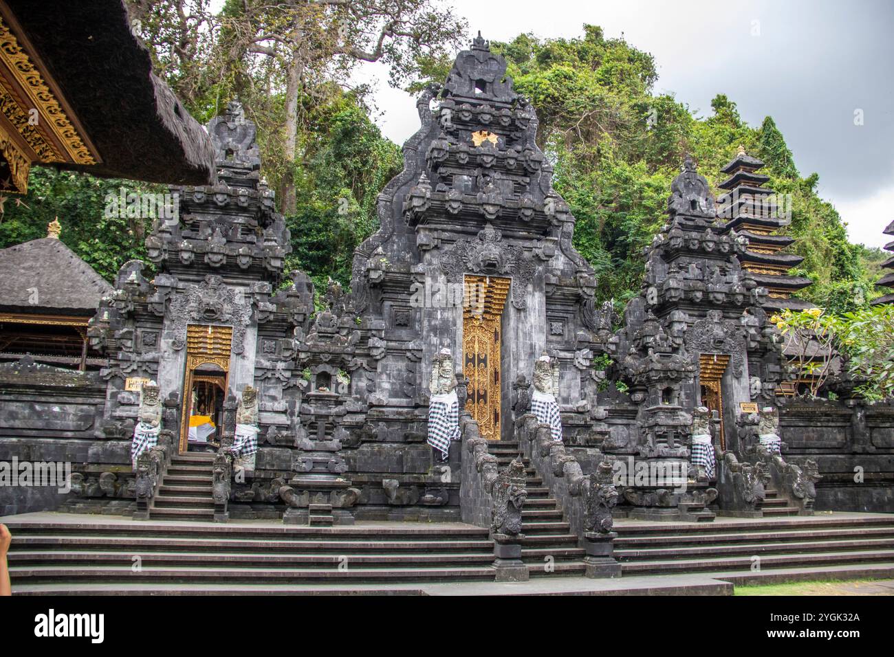 Temple complex of the Hindu faith. Lava stone temple in front of a ...