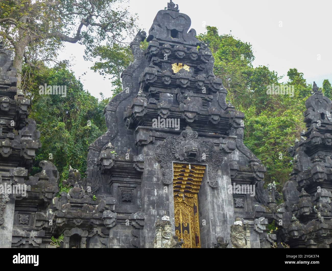 Temple complex of the Hindu faith. Lava stone temple in front of a ...