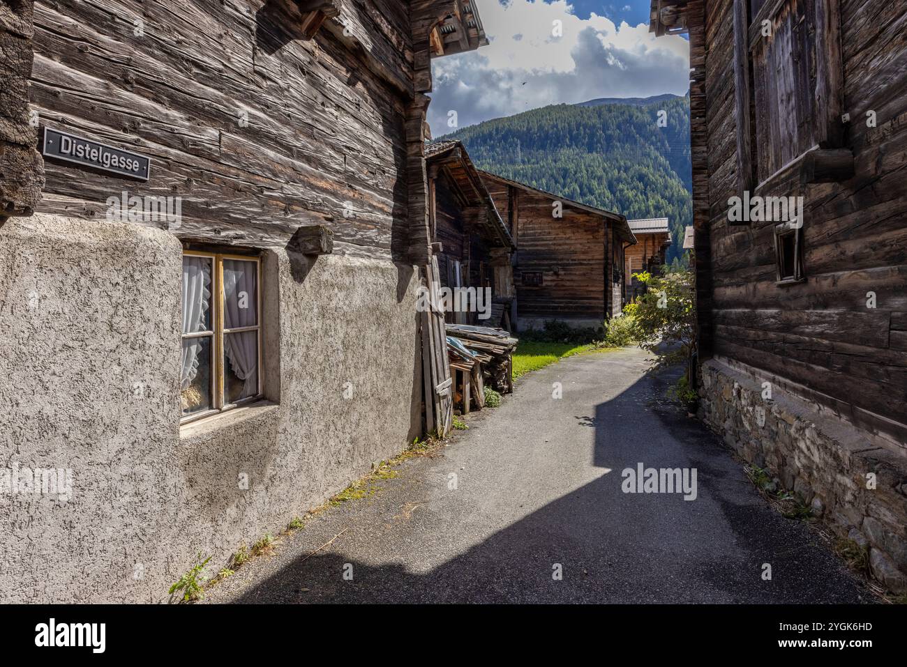 Typical traditional wooden houses in the Valais village of Ulrichen in ...