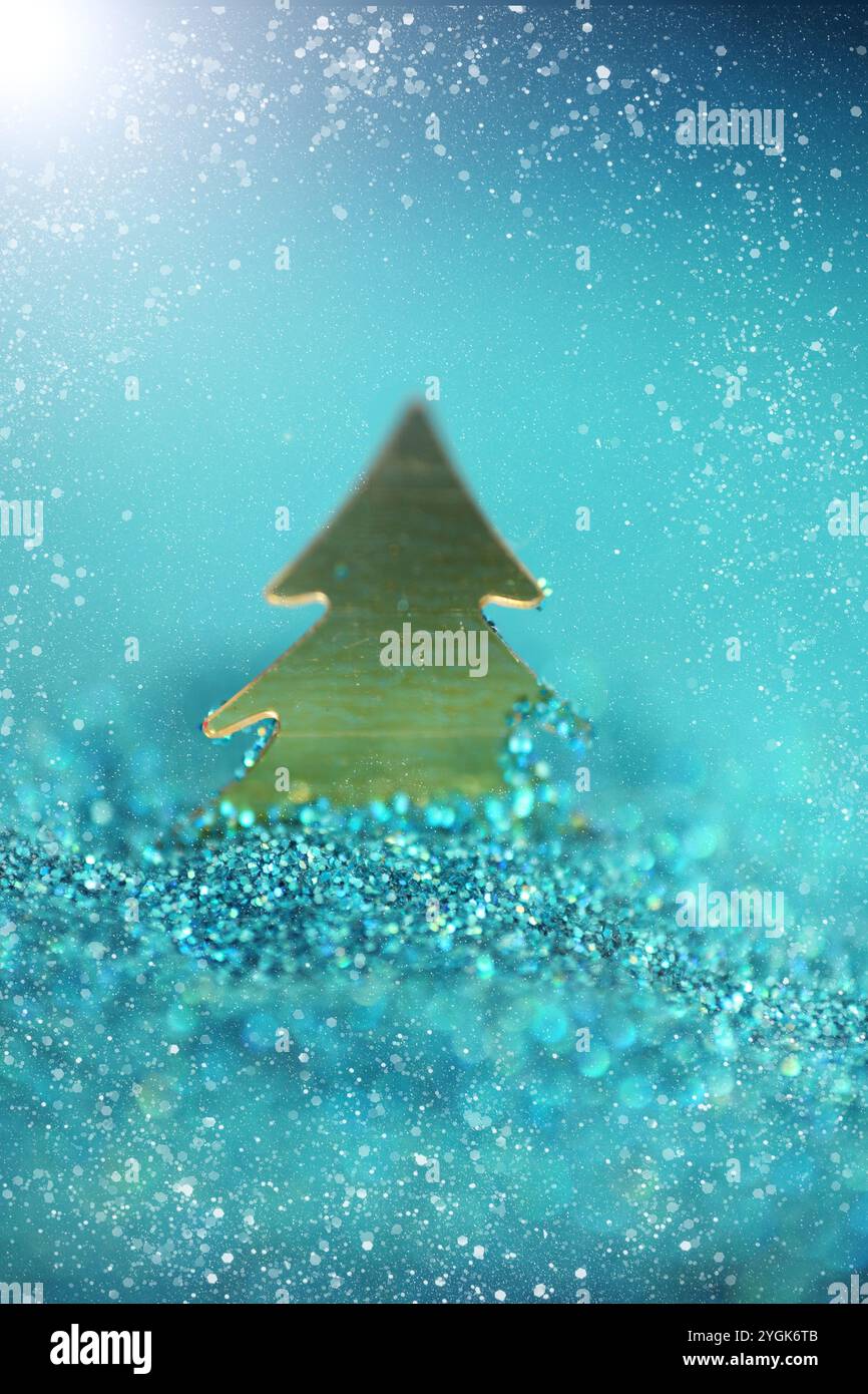 Christmas tree in blue glitter with blue bokeh,highlights and flares ...
