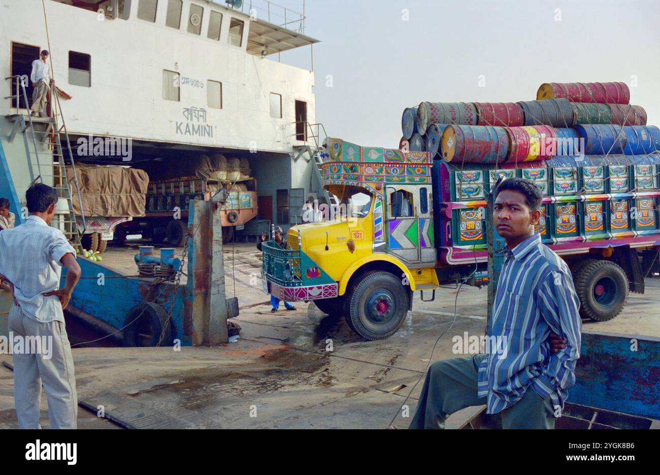 A colorful painted truck at Padma River ferry loading near Dhaka ...